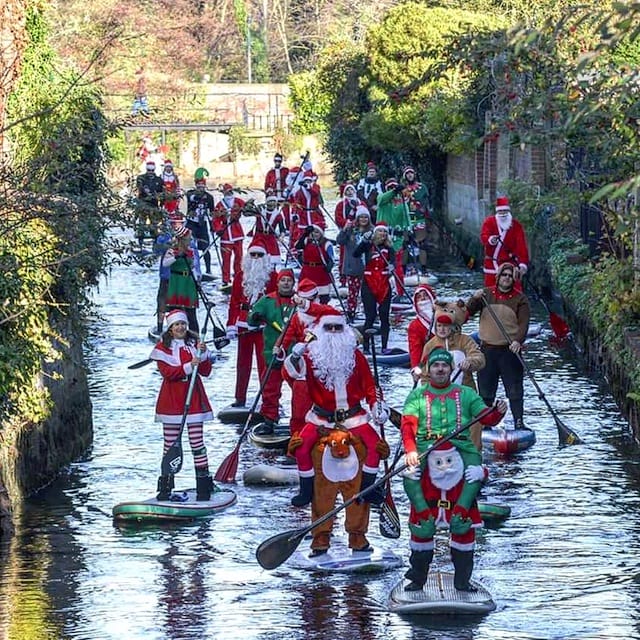 The Story Behind The Original Santa SUP Parade | TotalSUP