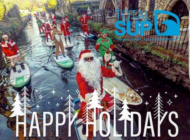The Story Behind The Original Santa SUP Parade | TotalSUP